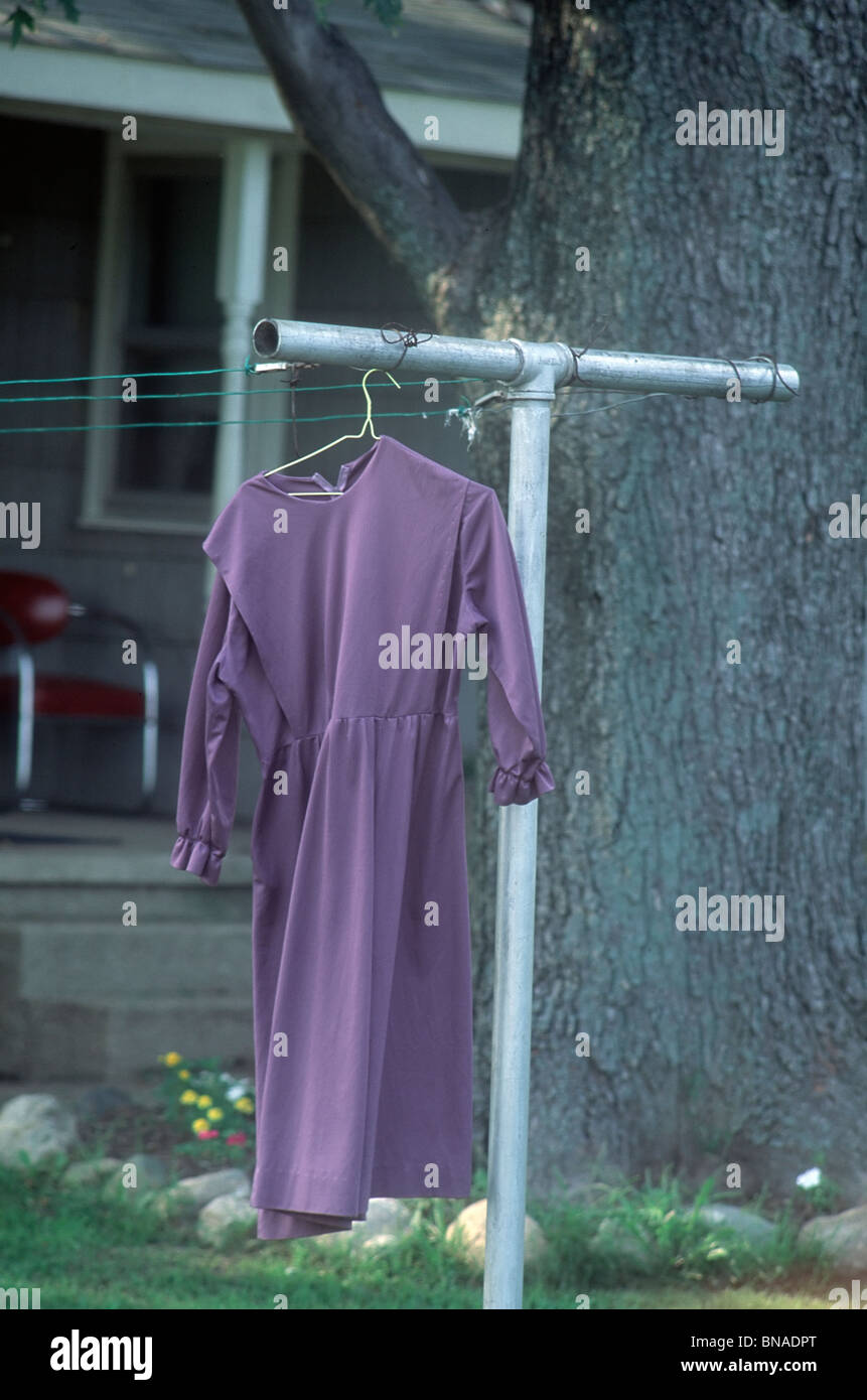 Amish dress hanging on washing line Stock Photo - Alamy
