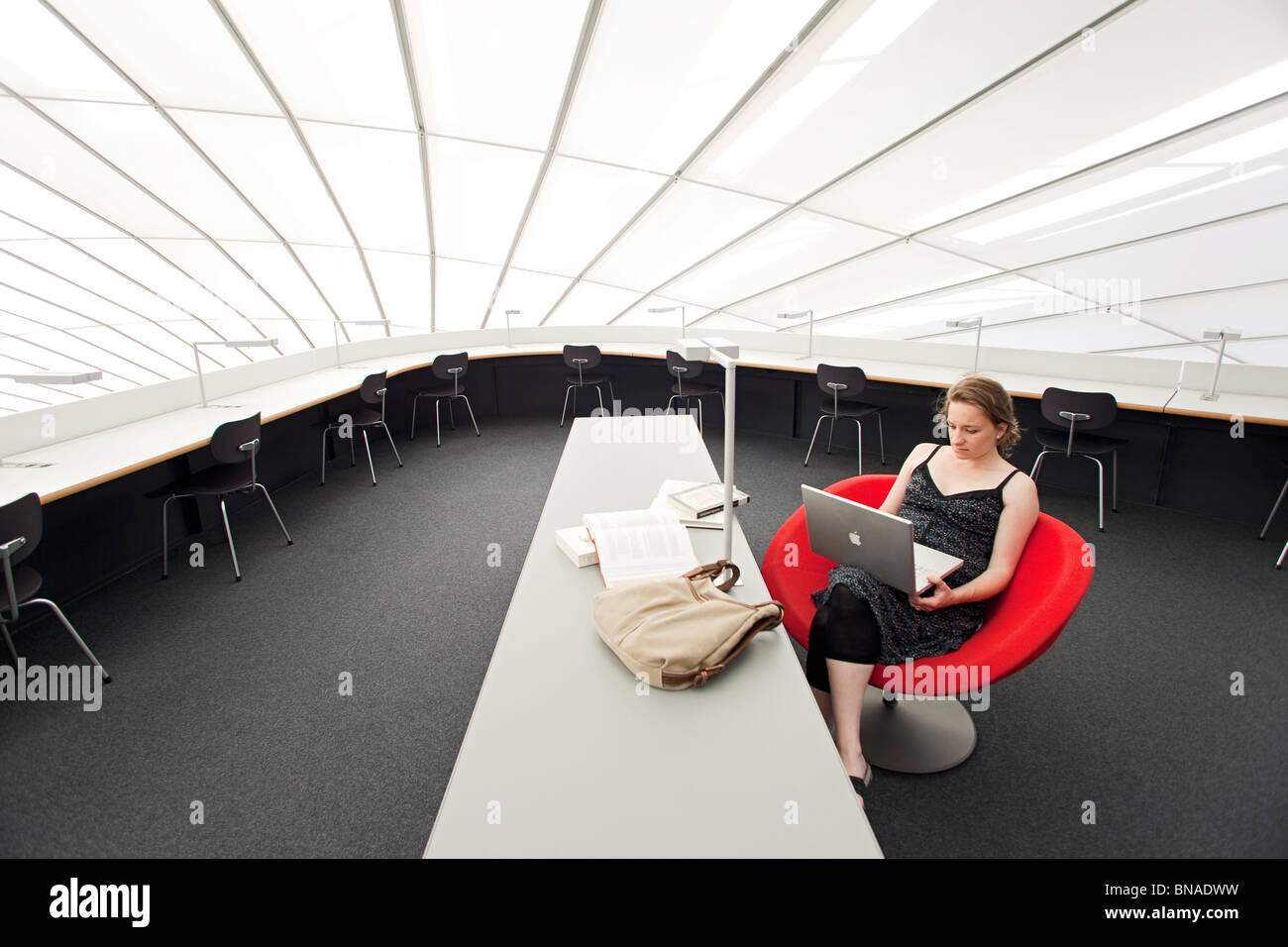 Young student in the Philologische Bibliothek (philological library) of ...