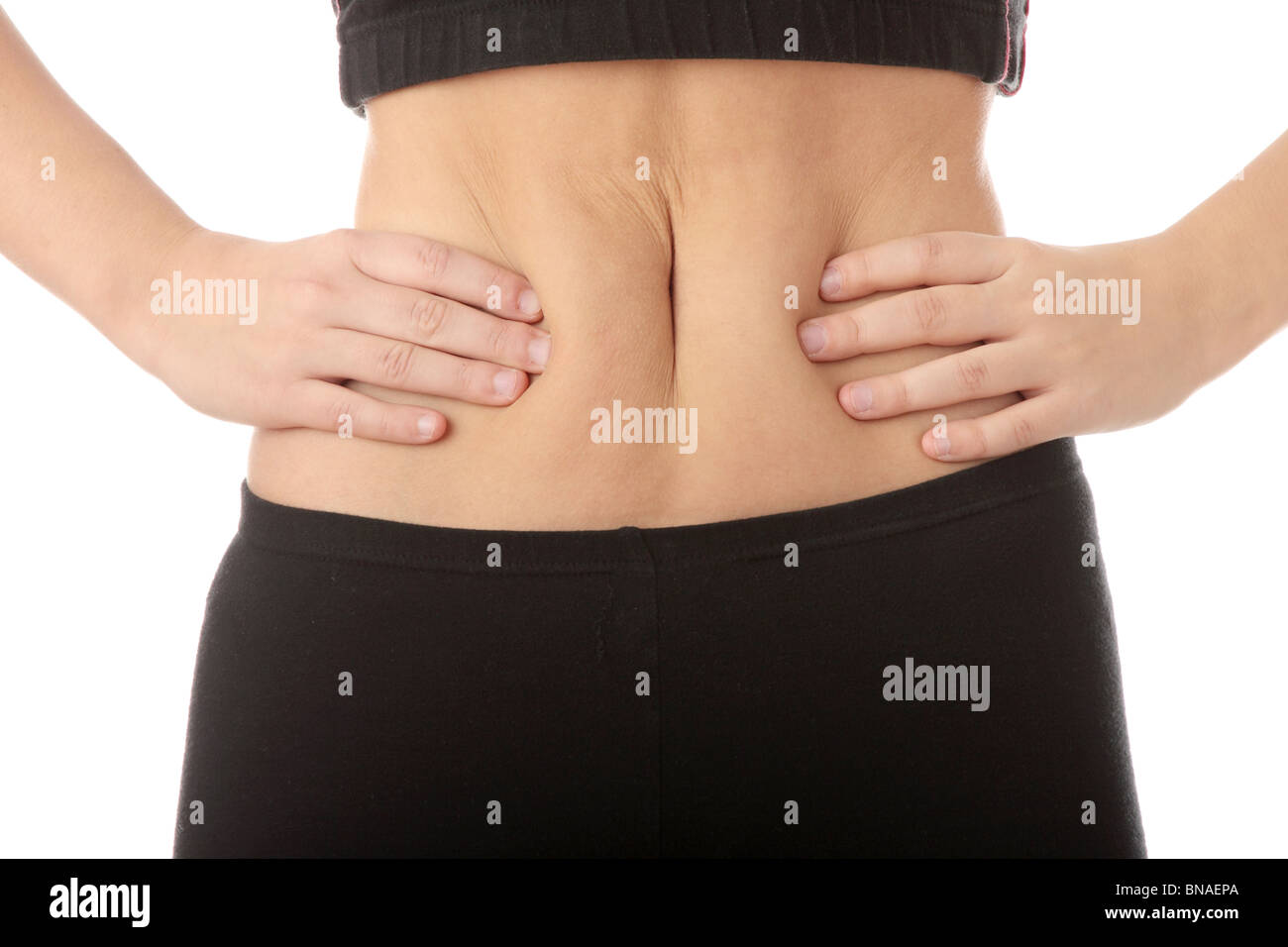 Girl pressing her stomach, isolated Stock Photo - Alamy