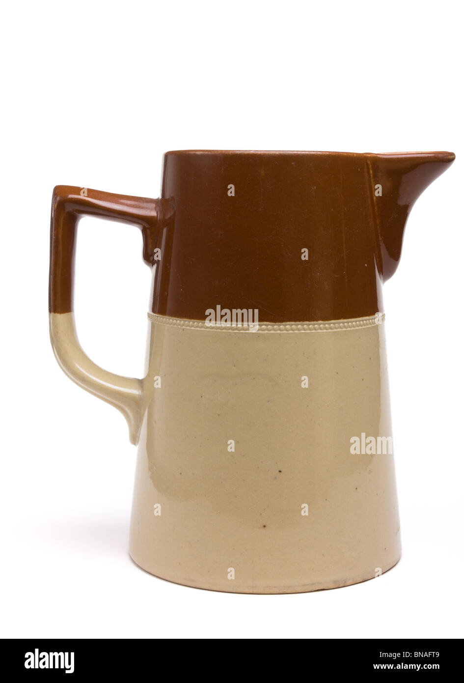 Vintage two tone Milk Jug isolated against white background Stock Photo ...