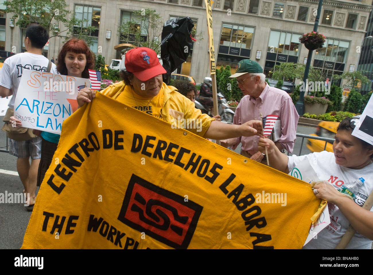 Pro-immigrant groups rally in front of Major League Baseball's offices ...