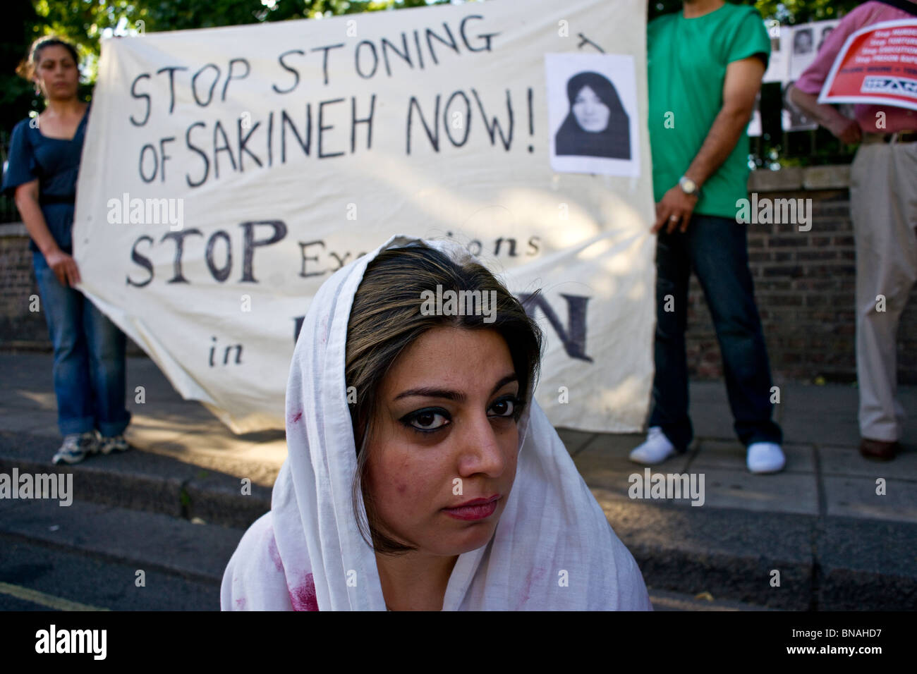 Iranians protest outside the Iranian embassy in London about stoning ...