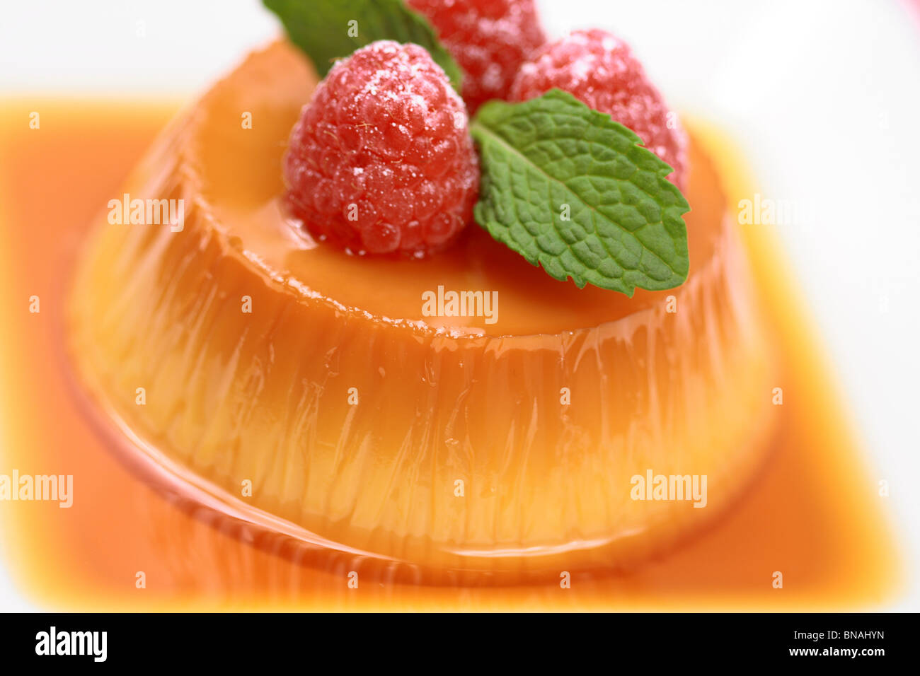 Flan dessert made with prime fresh berries and organic milk Stock Photo ...