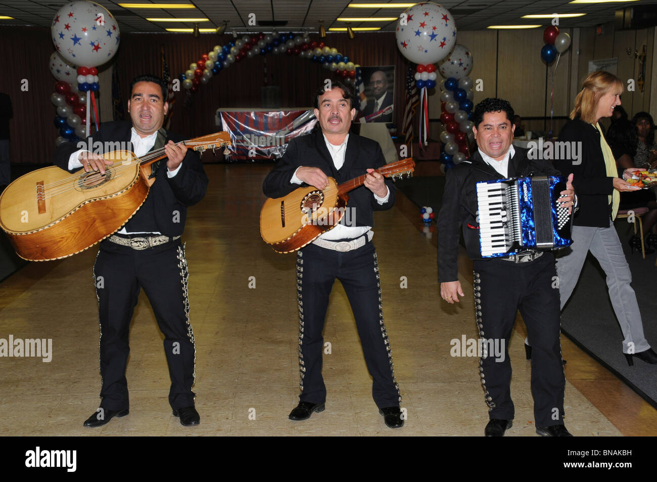 Three Mexican musicians play at a political event in Forestville ...