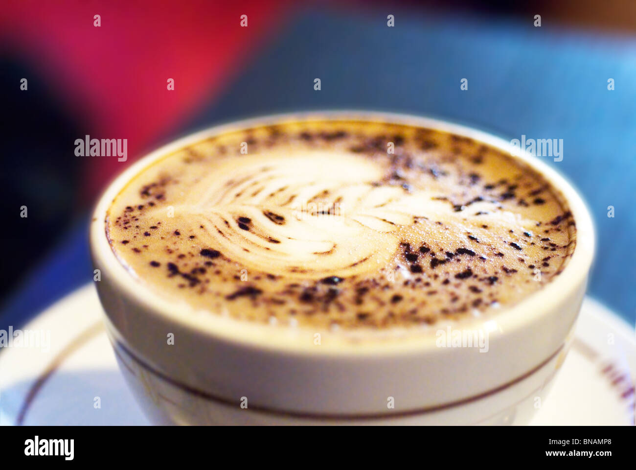 cappuccino cup dof,with heart shaped cocoa powder decoration Stock ...