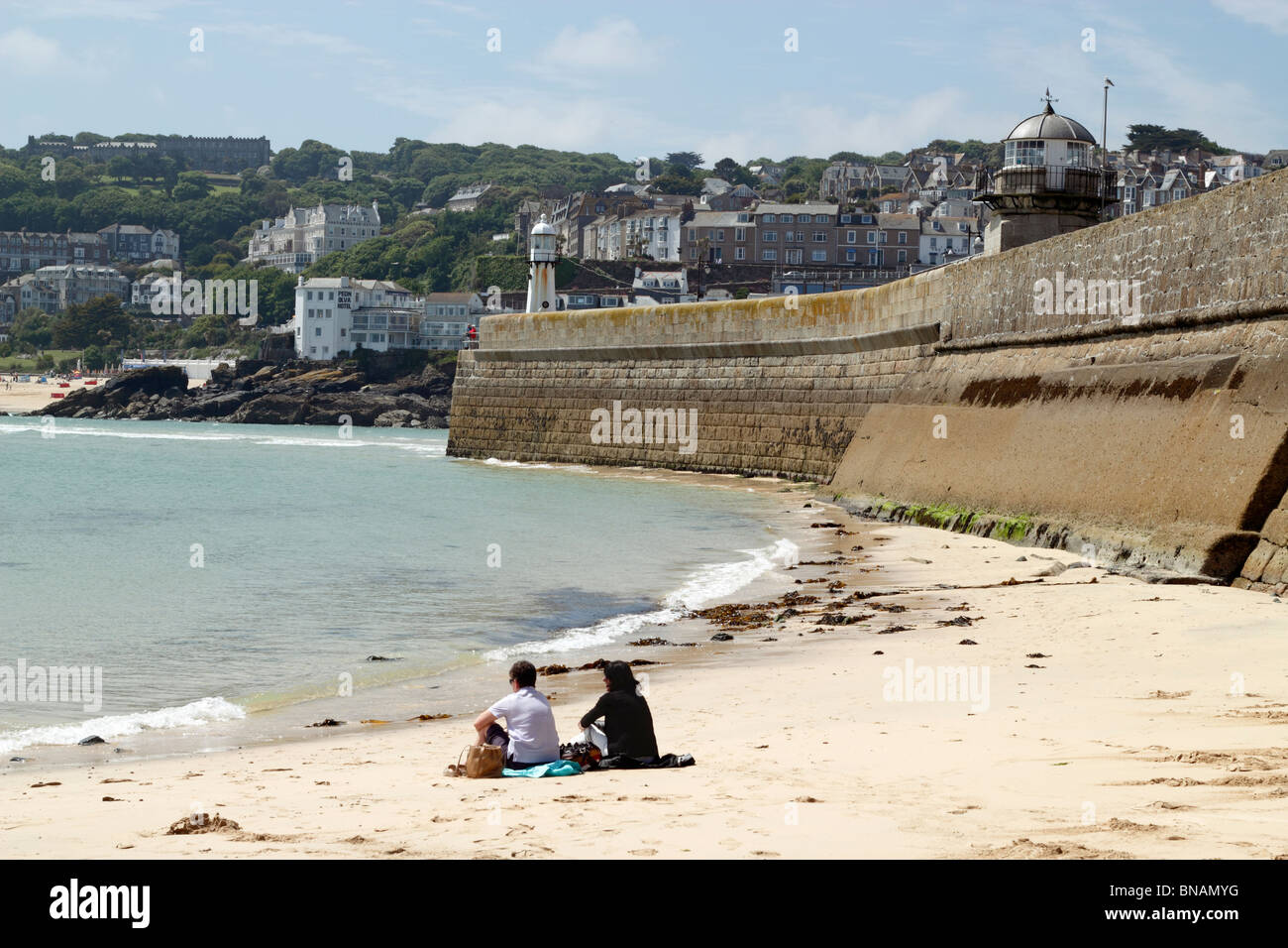 The small sandy beach next to Smeaton's pier in St. Ives, Cornwall UK ...