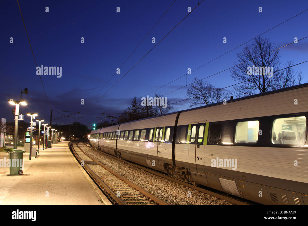 Vedbæk (denmark) train station by night Stock Photo - Alamy