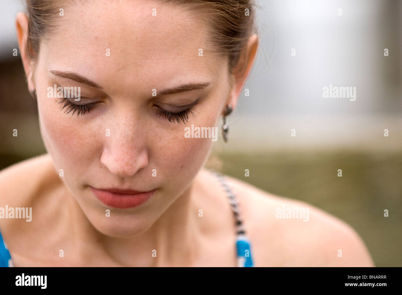 A young woman contemplating an issue in her life Stock Photo - Alamy