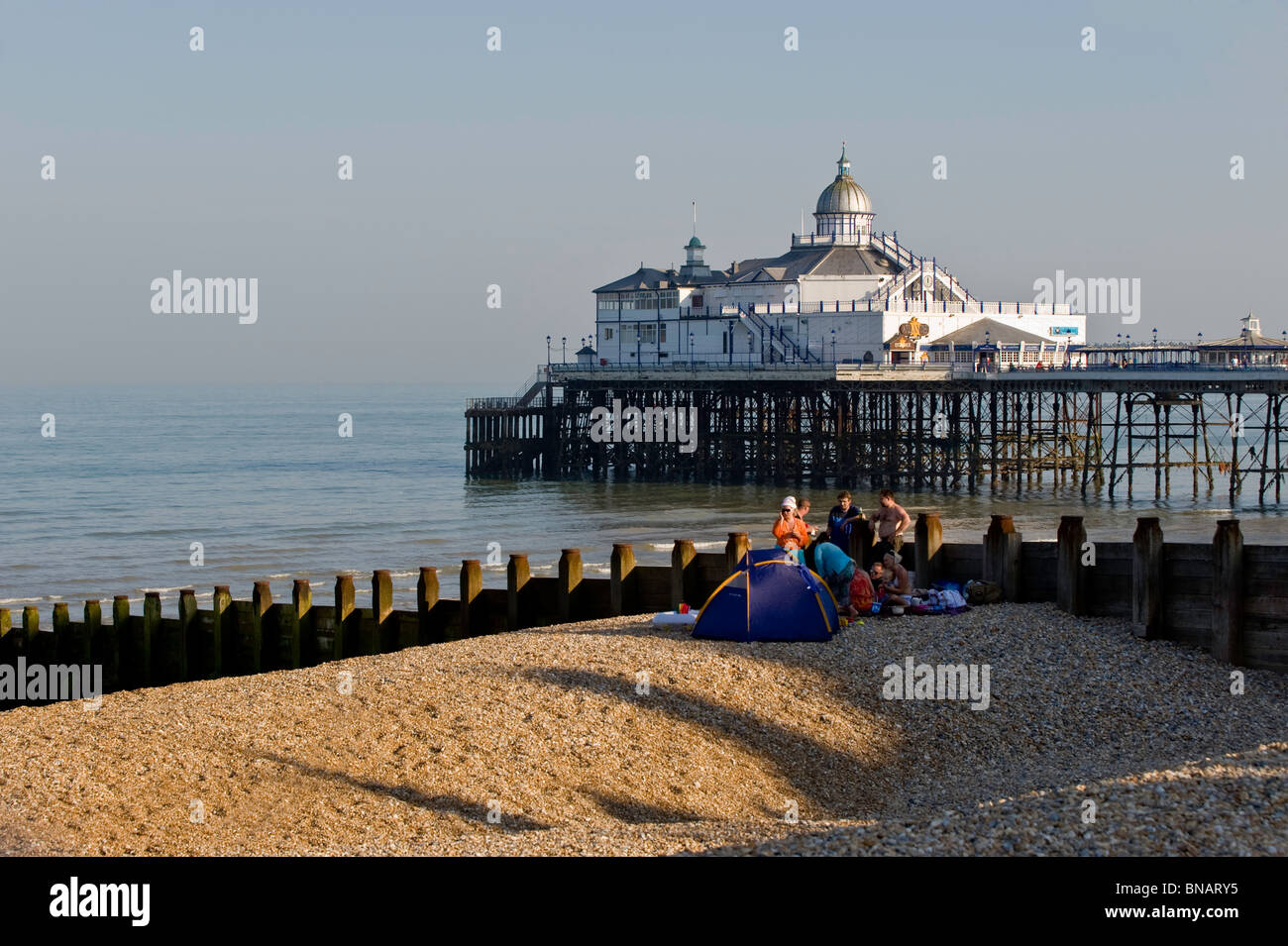 Pebble beach and pier, Eastbourne, East Sussex, United Kingdom Stock ...