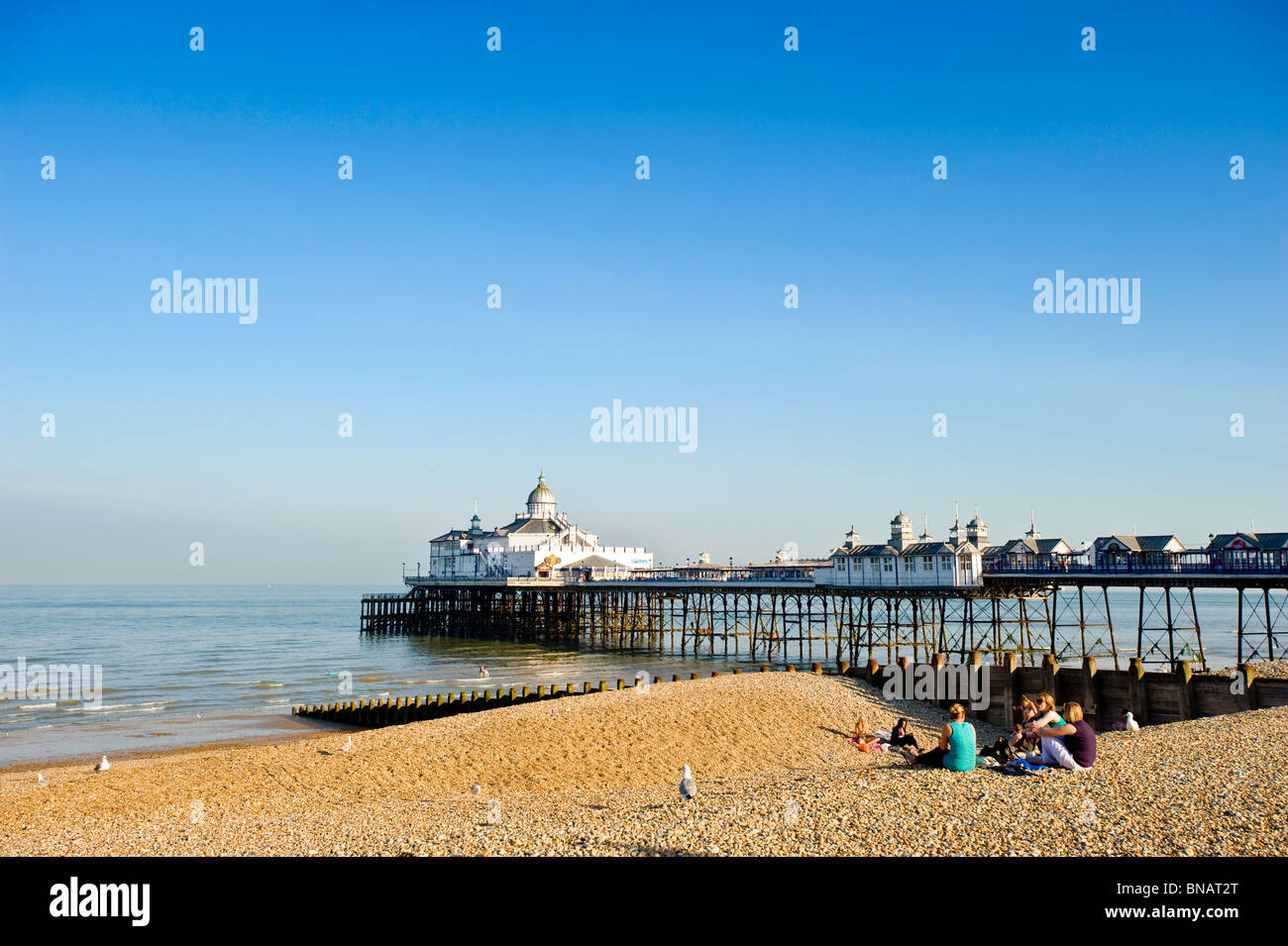 Pebble beach and pier, Eastbourne, East Sussex, United Kingdom Stock ...