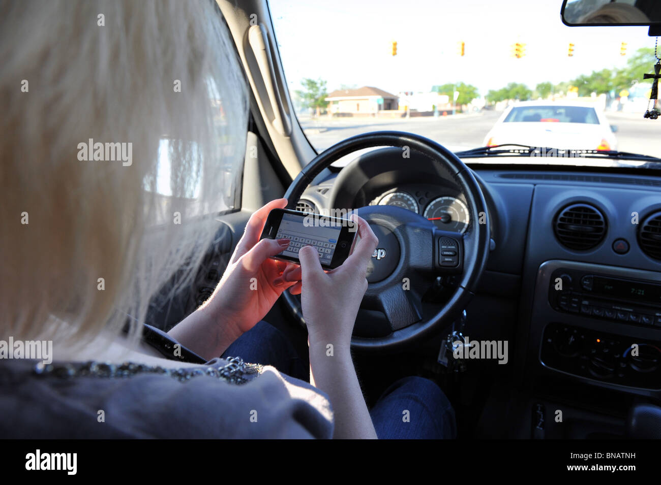 Woman whilst driving hi-res stock photography and images - Alamy