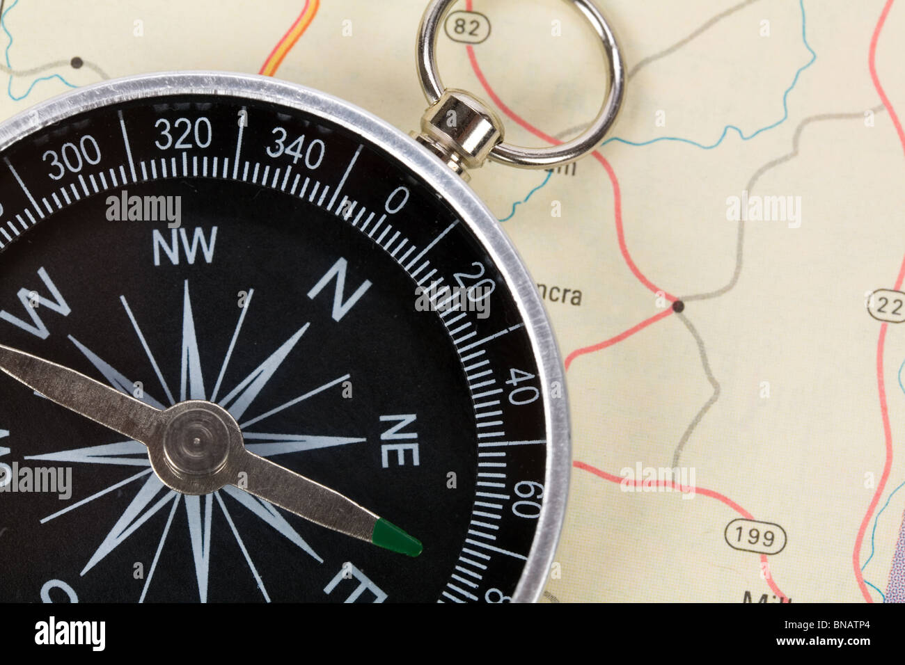 Compass and map close up shot Stock Photo - Alamy