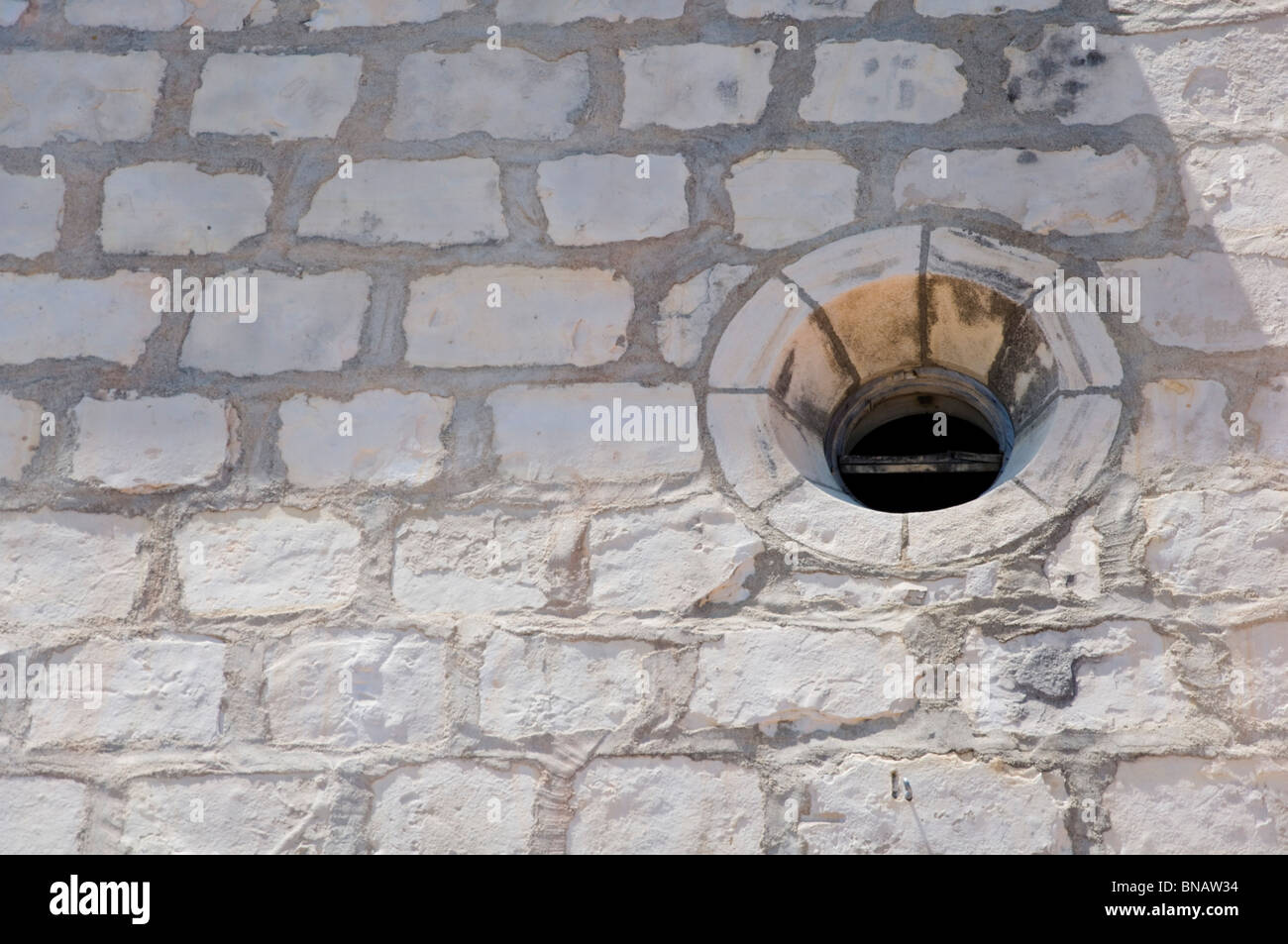Stone building round window hi-res stock photography and images - Alamy
