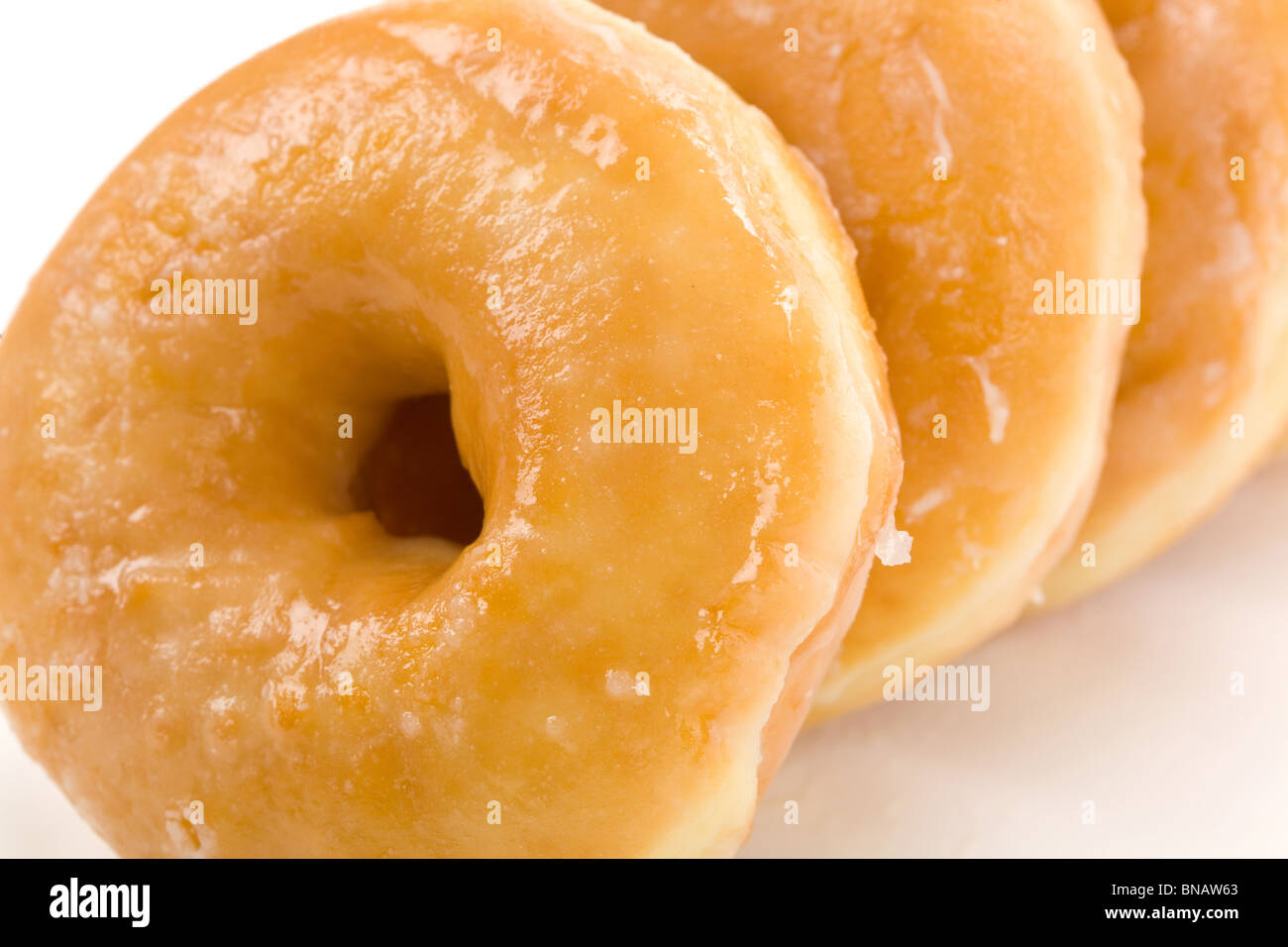 a sweet donut with white background Stock Photo - Alamy