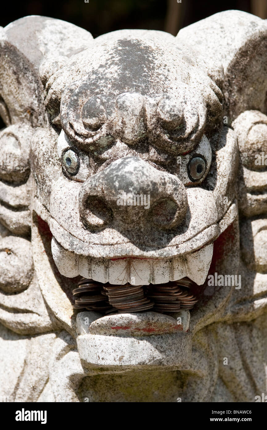 Shinto Shrine Guard Lion Dog sculpture protecting the Shrine entrance ...