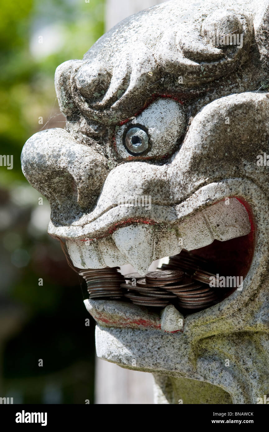 Shinto Shrine Guard Lion Dog sculpture protecting the Shrine entrance ...