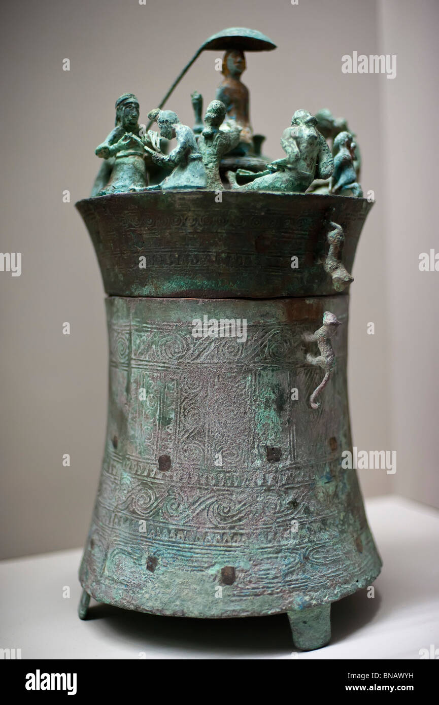 A container for cowrie shells with figures of weavers, bronze , Easter ...