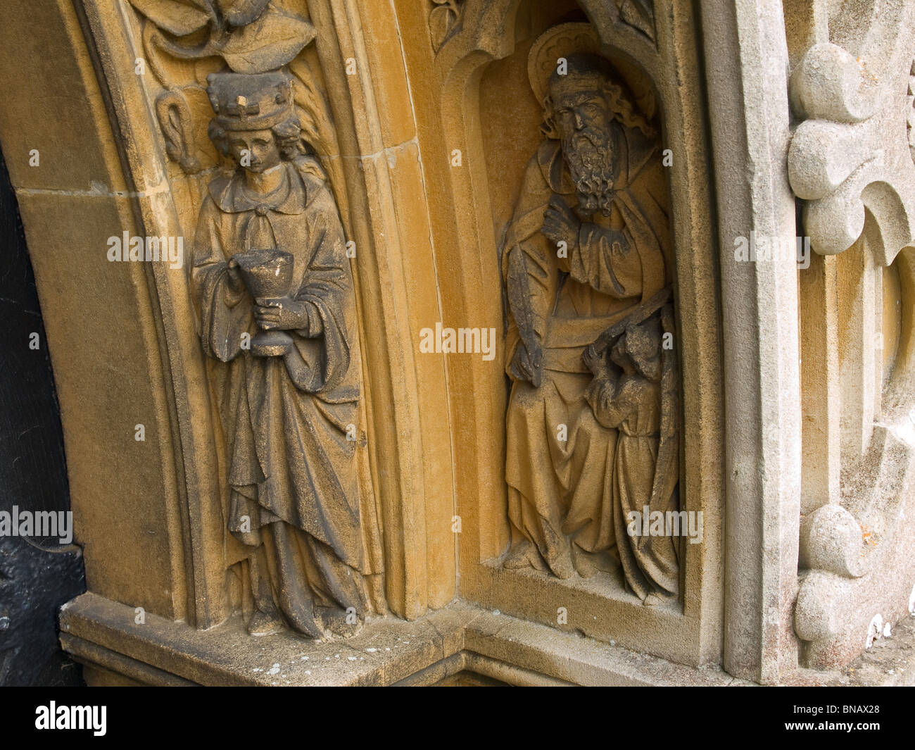 Stone carving around door of St Michaels and All Angels Church ...
