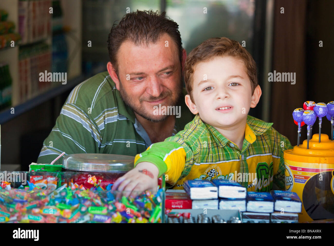 Candy vendor and his young son in Trabzon, Turkey Stock Photo - Alamy