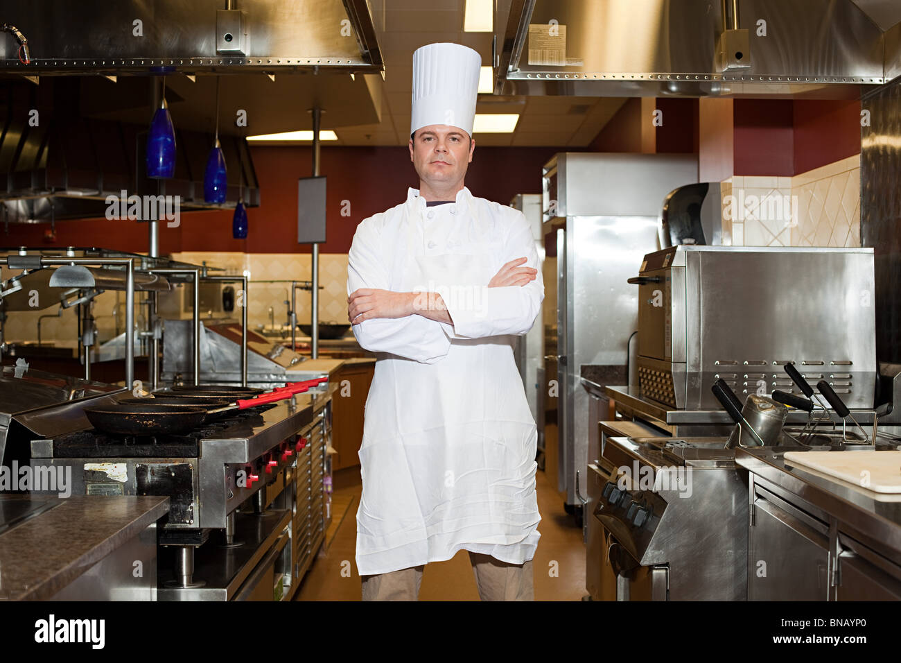 Male chef in commercial kitchen, portrait Stock Photo - Alamy