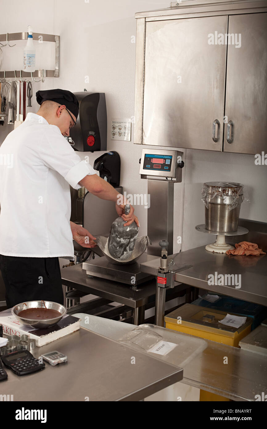Male chef weighing ingredients Stock Photo - Alamy