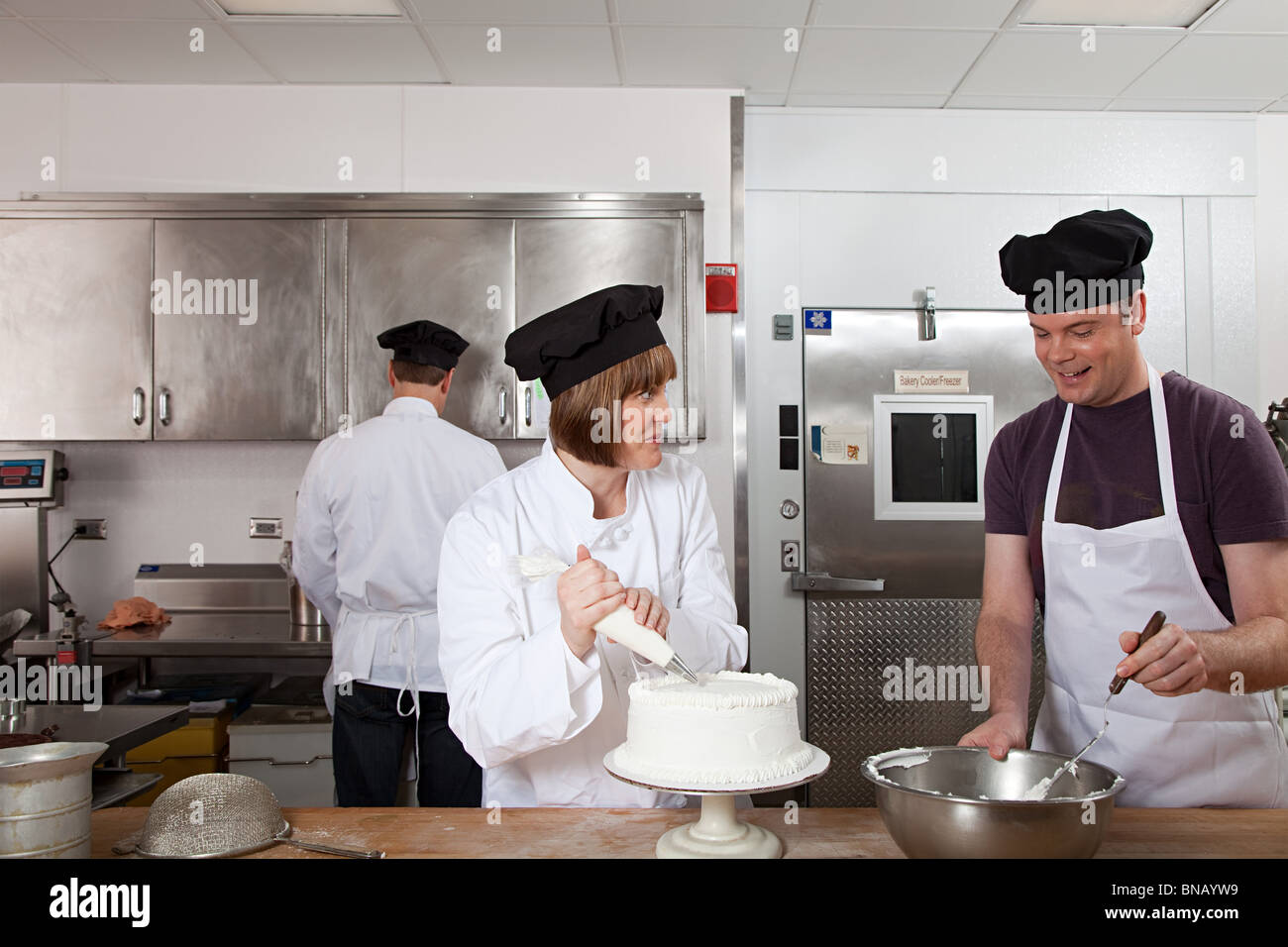 Making Cake In Commercial Kitchen High Resolution Stock Photography and ...