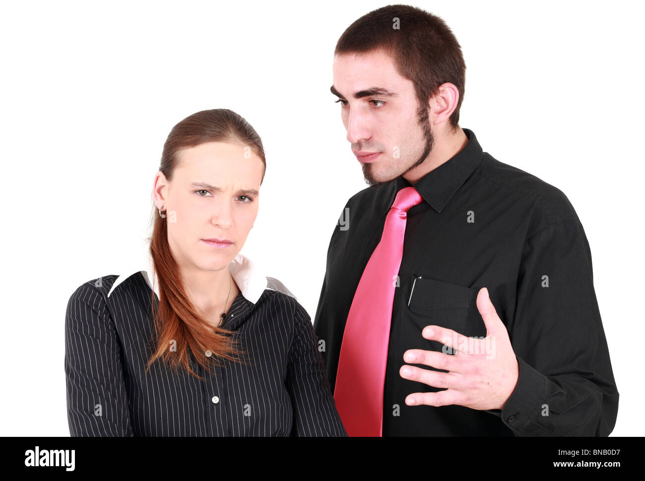 Young manager explaining problem to the boss, studio shot Stock Photo ...