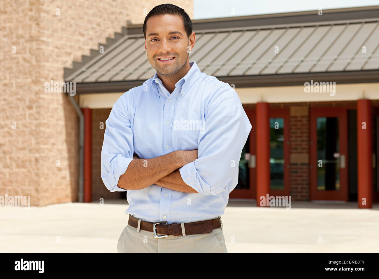 Portrait of male high school teacher Stock Photo - Alamy