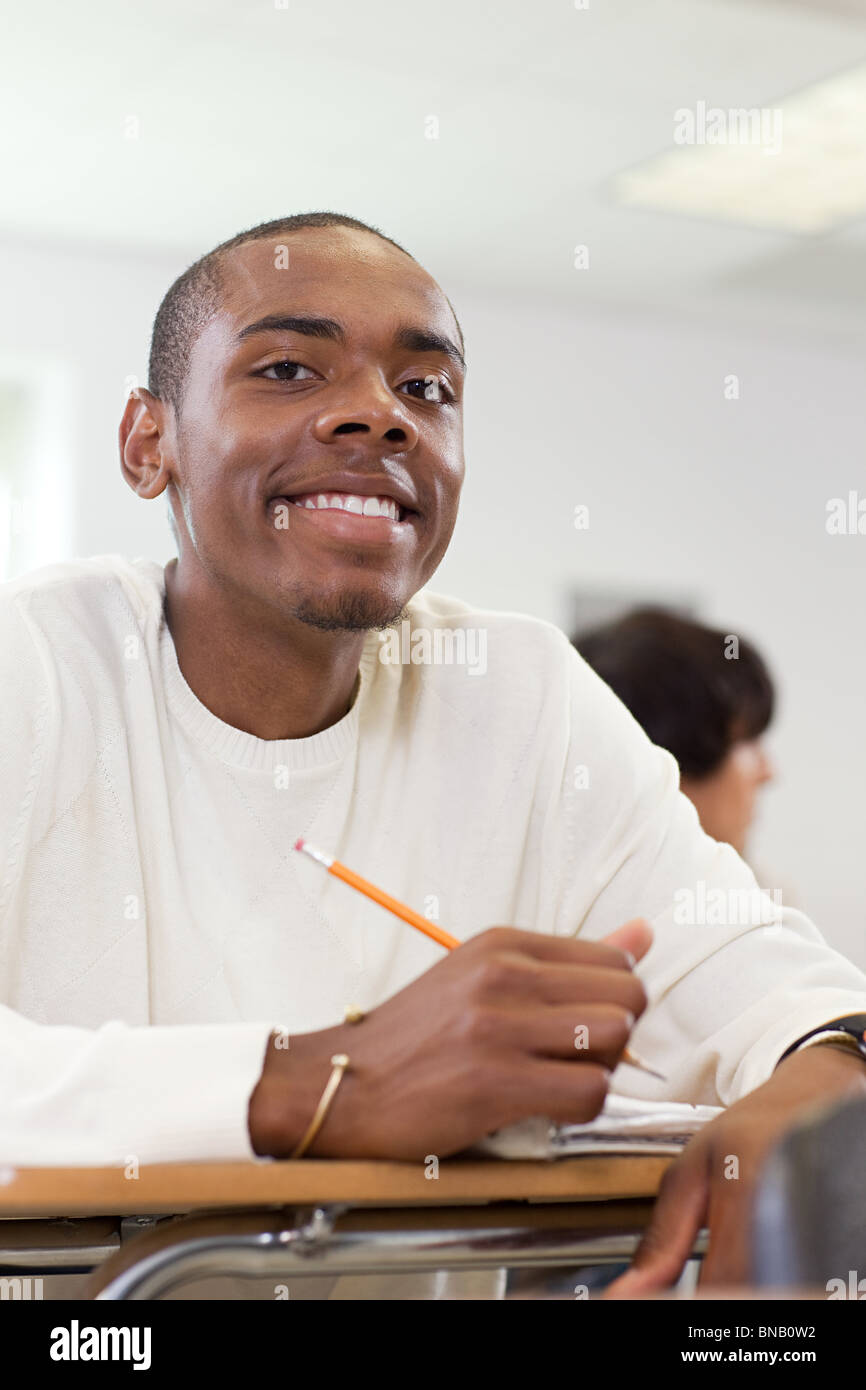 High school student sitting in classroom Stock Photo - Alamy