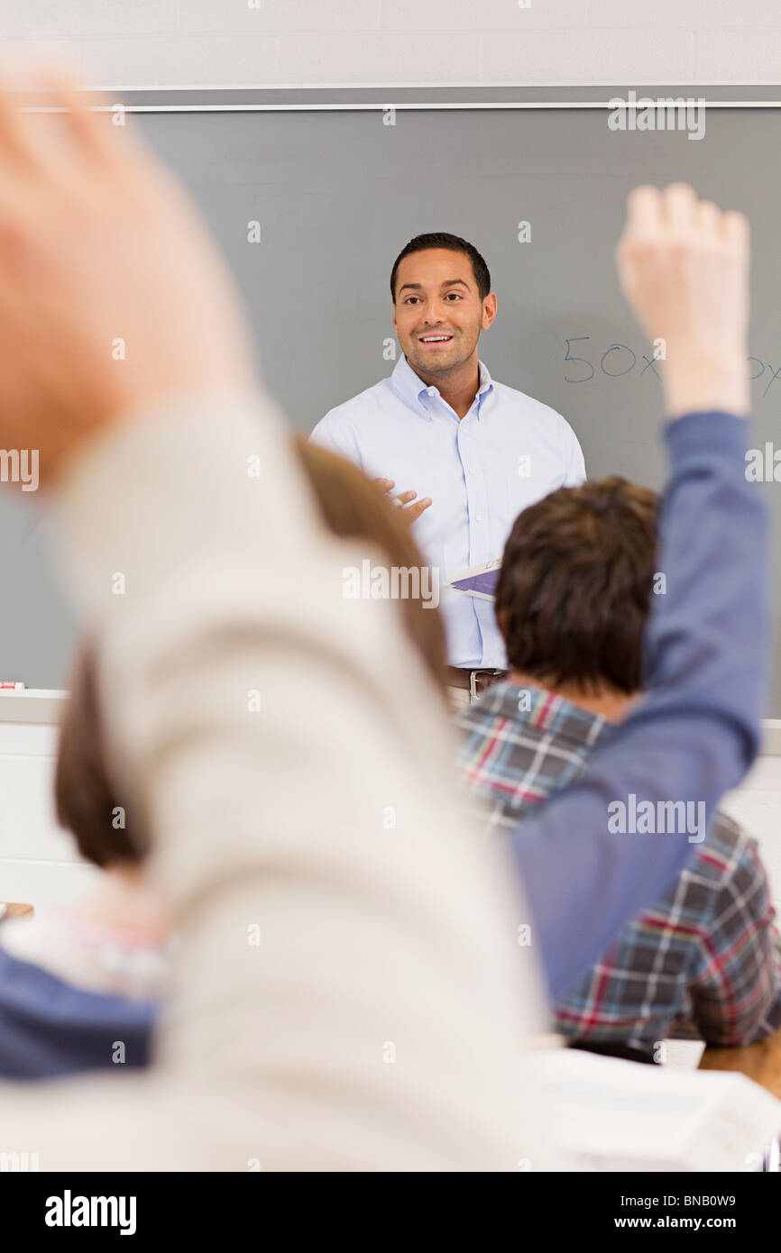 High school students and teacher in classroom Stock Photo - Alamy