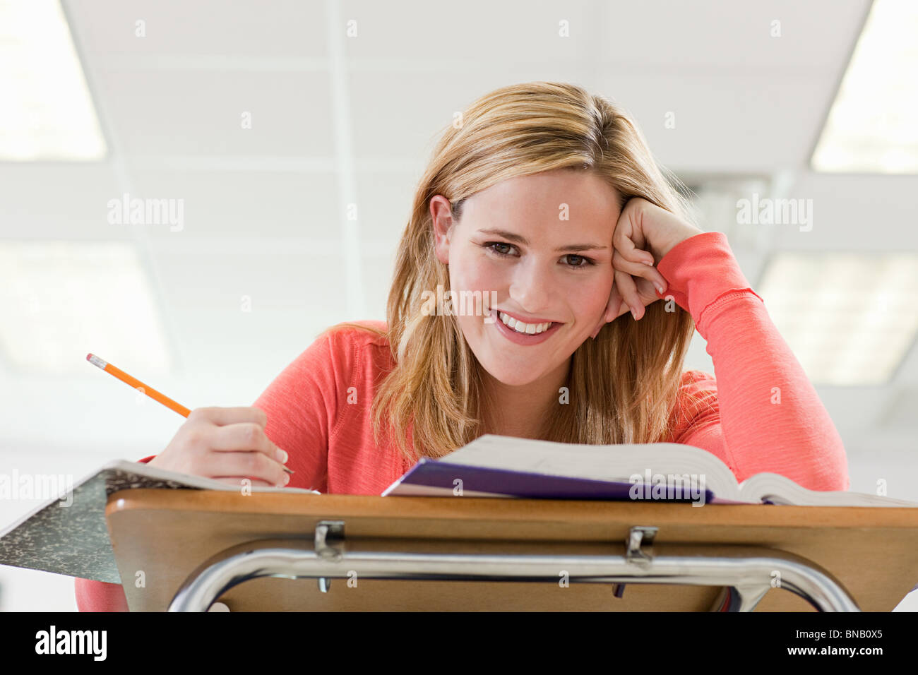High school student sitting in classroom Stock Photo - Alamy