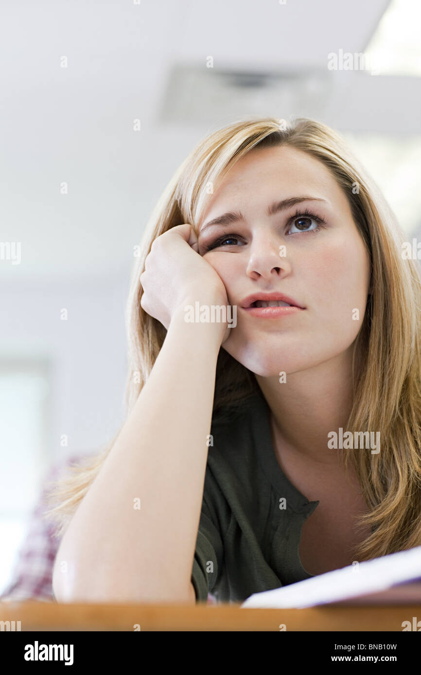 Bored female high school student Stock Photo - Alamy