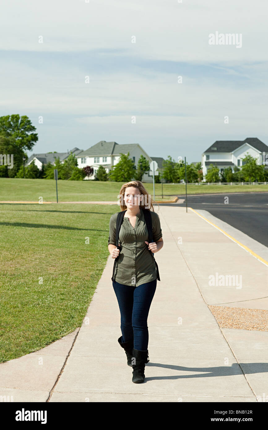 Female High School Student Walking Stock Photos & Female High School ...