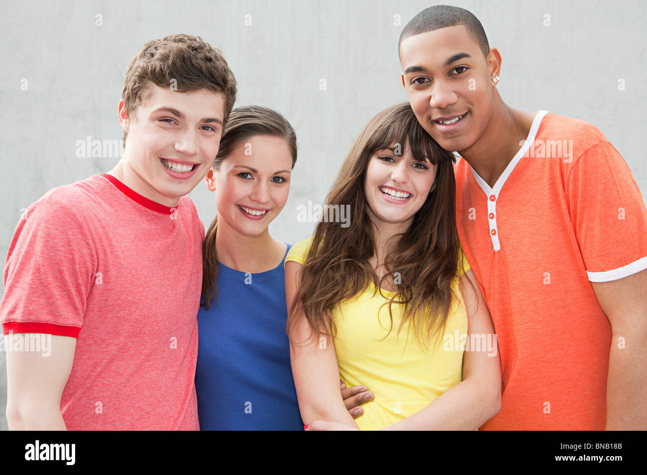 Four young friends Stock Photo - Alamy