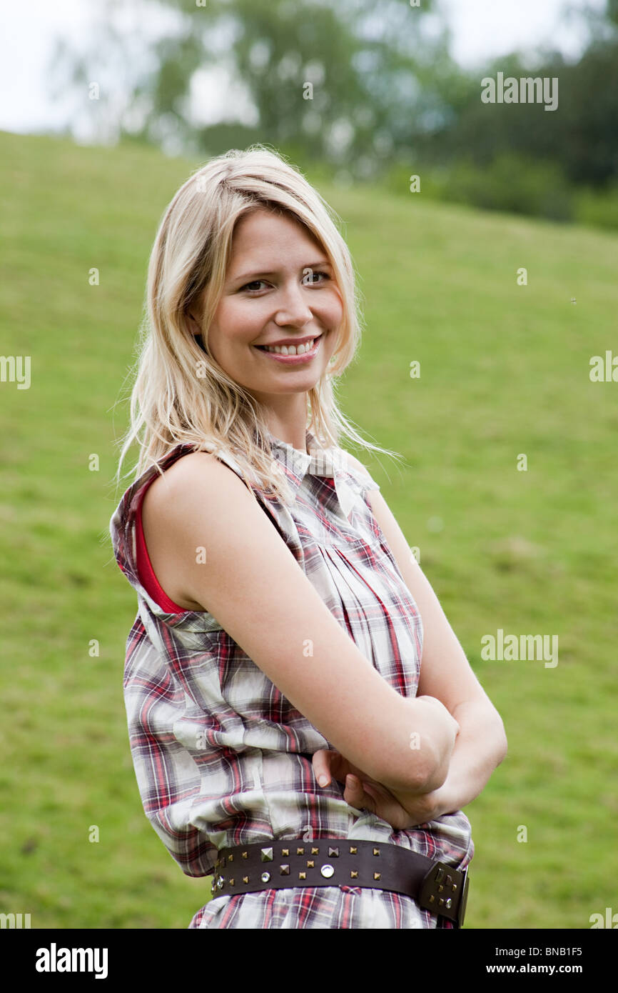Young woman in countryside Stock Photo - Alamy