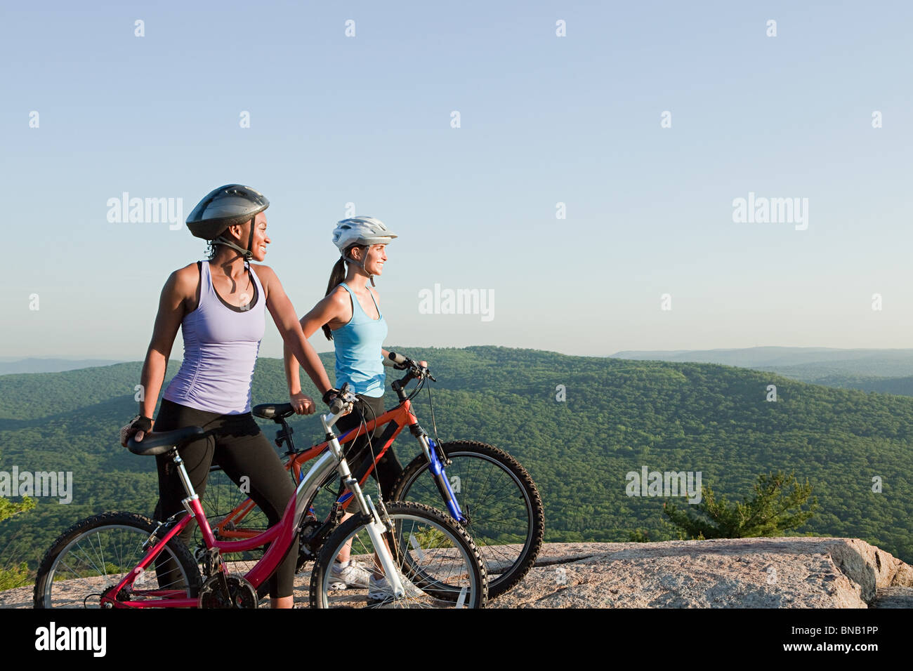 Two women cyclists hi-res stock photography and images - Alamy