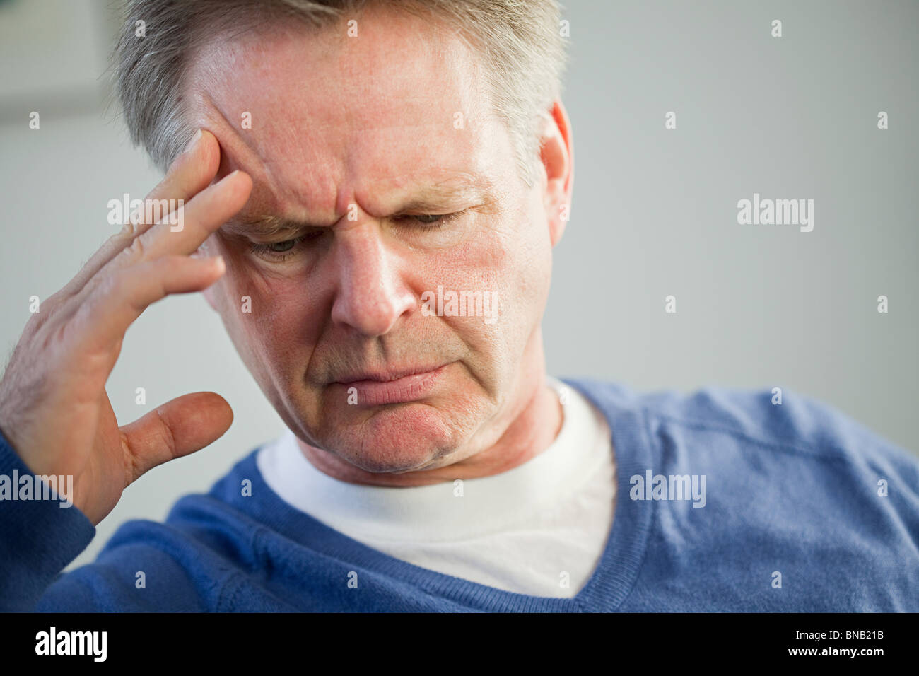 Man looking stressed Stock Photo - Alamy