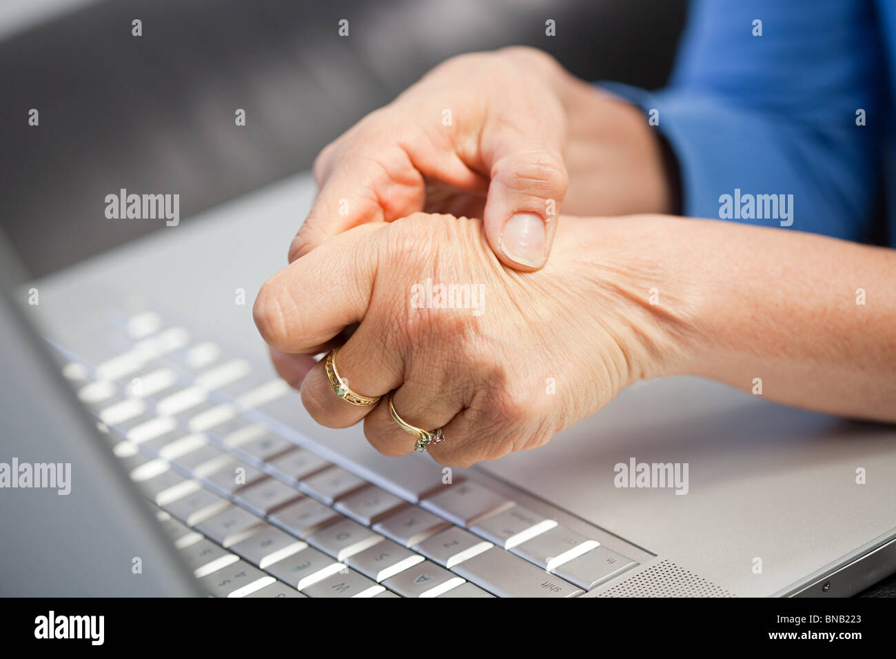 Female hand rubbing laptop computer hi-res stock photography and images ...