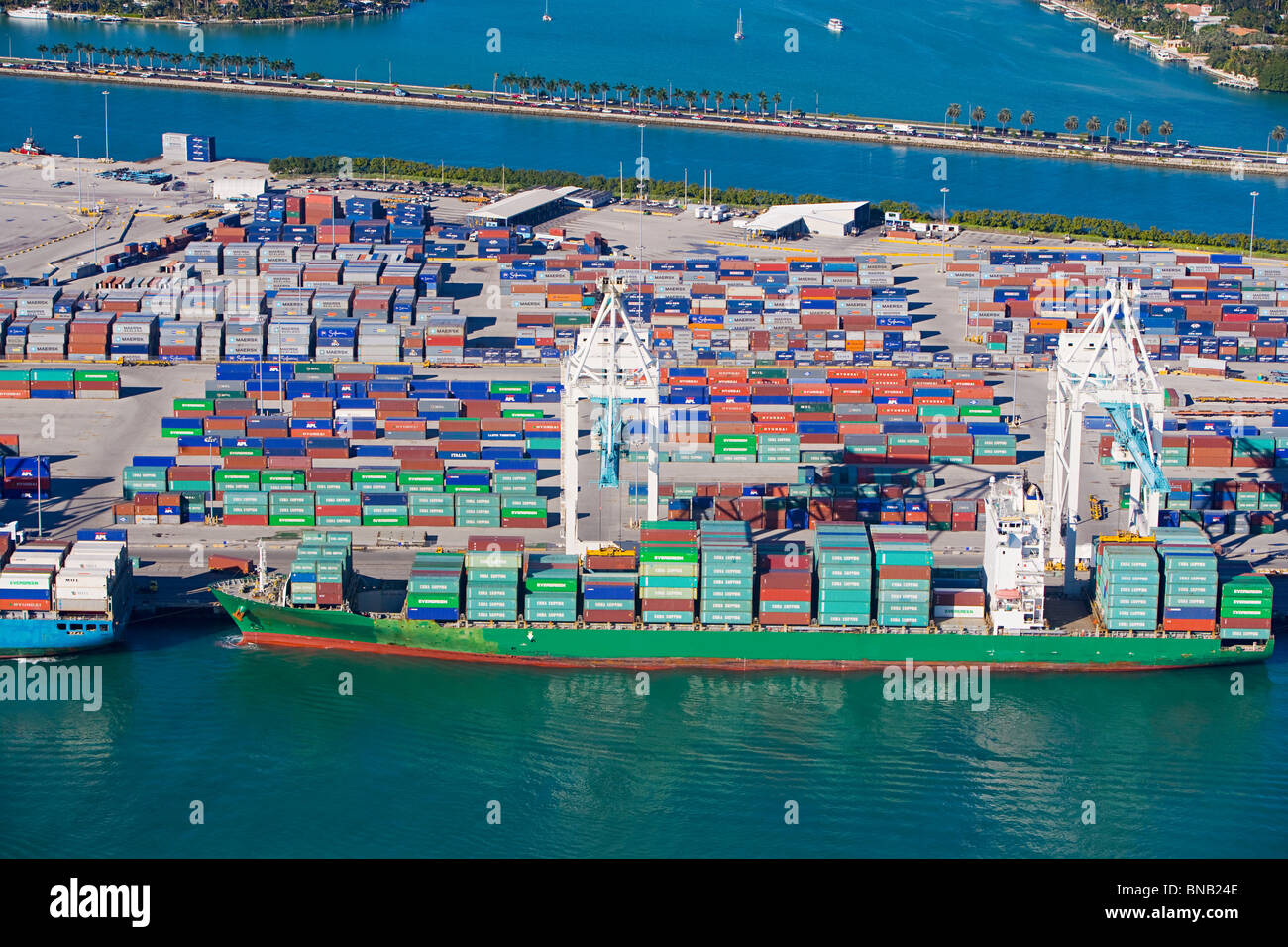 Cargo containers at shipping dock Stock Photo - Alamy