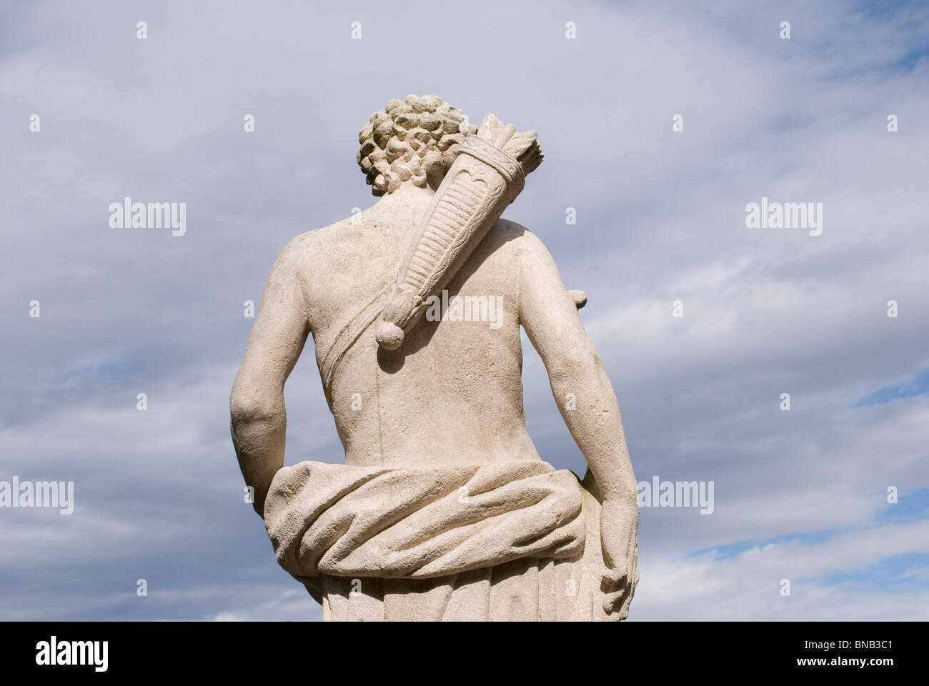 rear view of statue with quiver against sky Stock Photo - Alamy