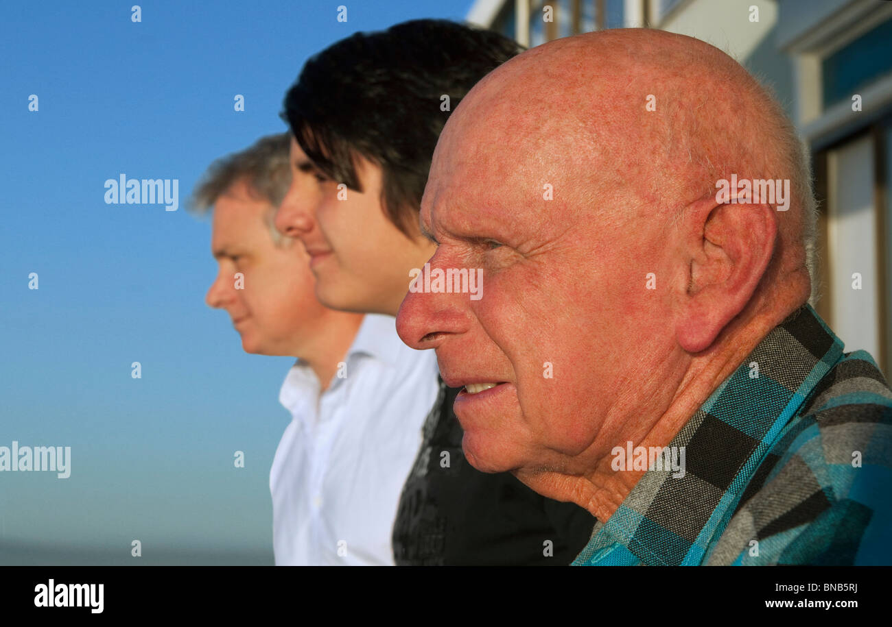 Three generations of men Stock Photo - Alamy
