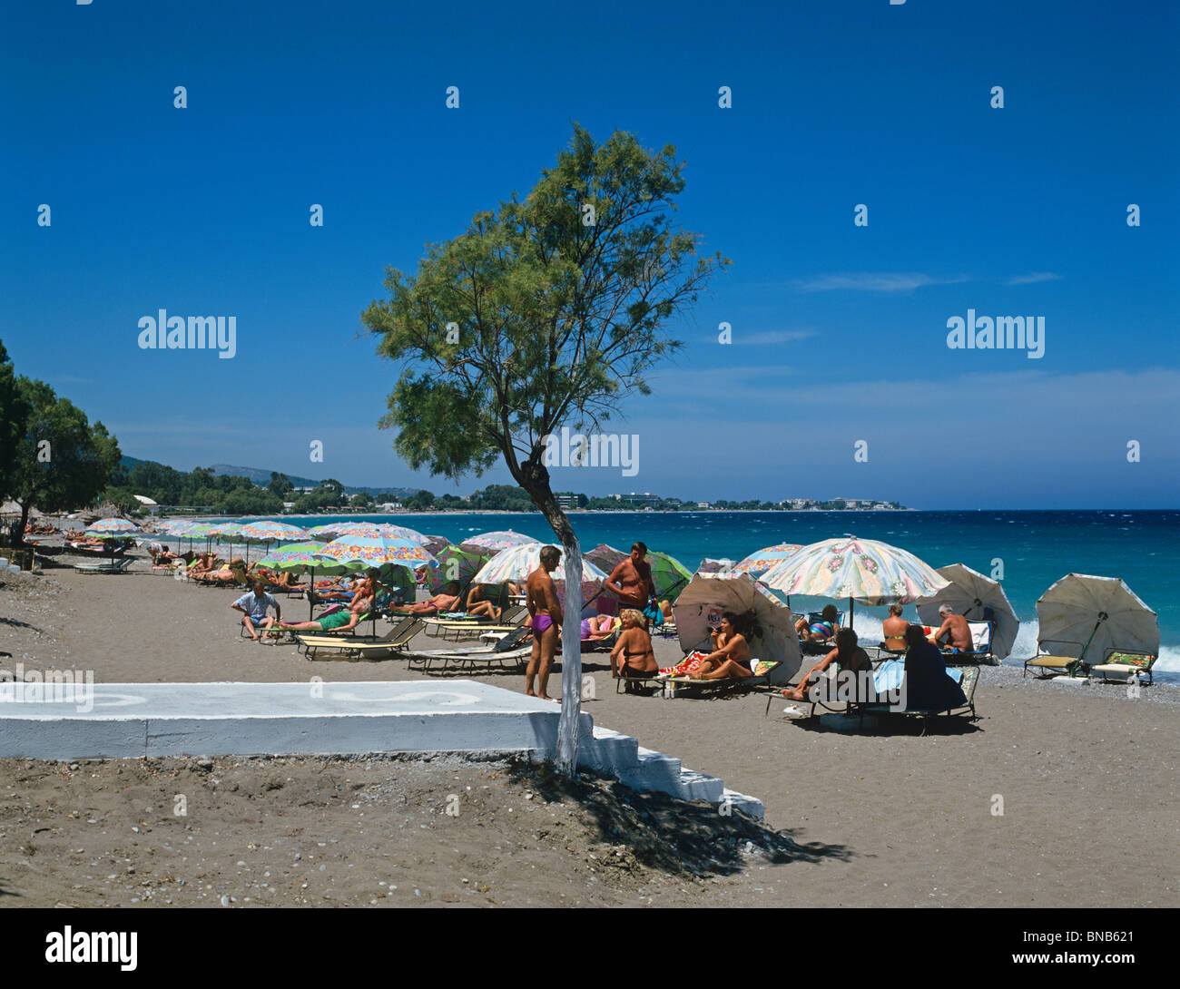 View of the beach at Ixia a popular resort near Rhodes Town Stock Photo ...