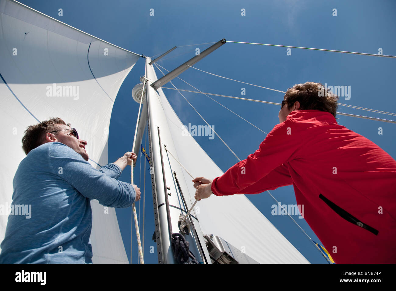 Man pulling on rope hi-res stock photography and images - Alamy