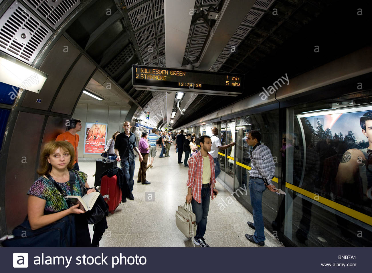 Woman London Underground Reading Stock Photos & Woman London ...