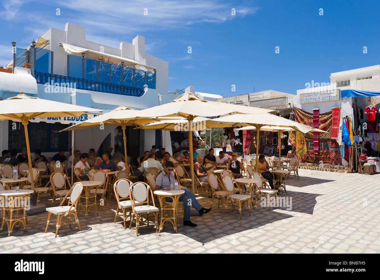 Sidewalk cafe and shops in the centre of Houmt Souk (the island capital ...