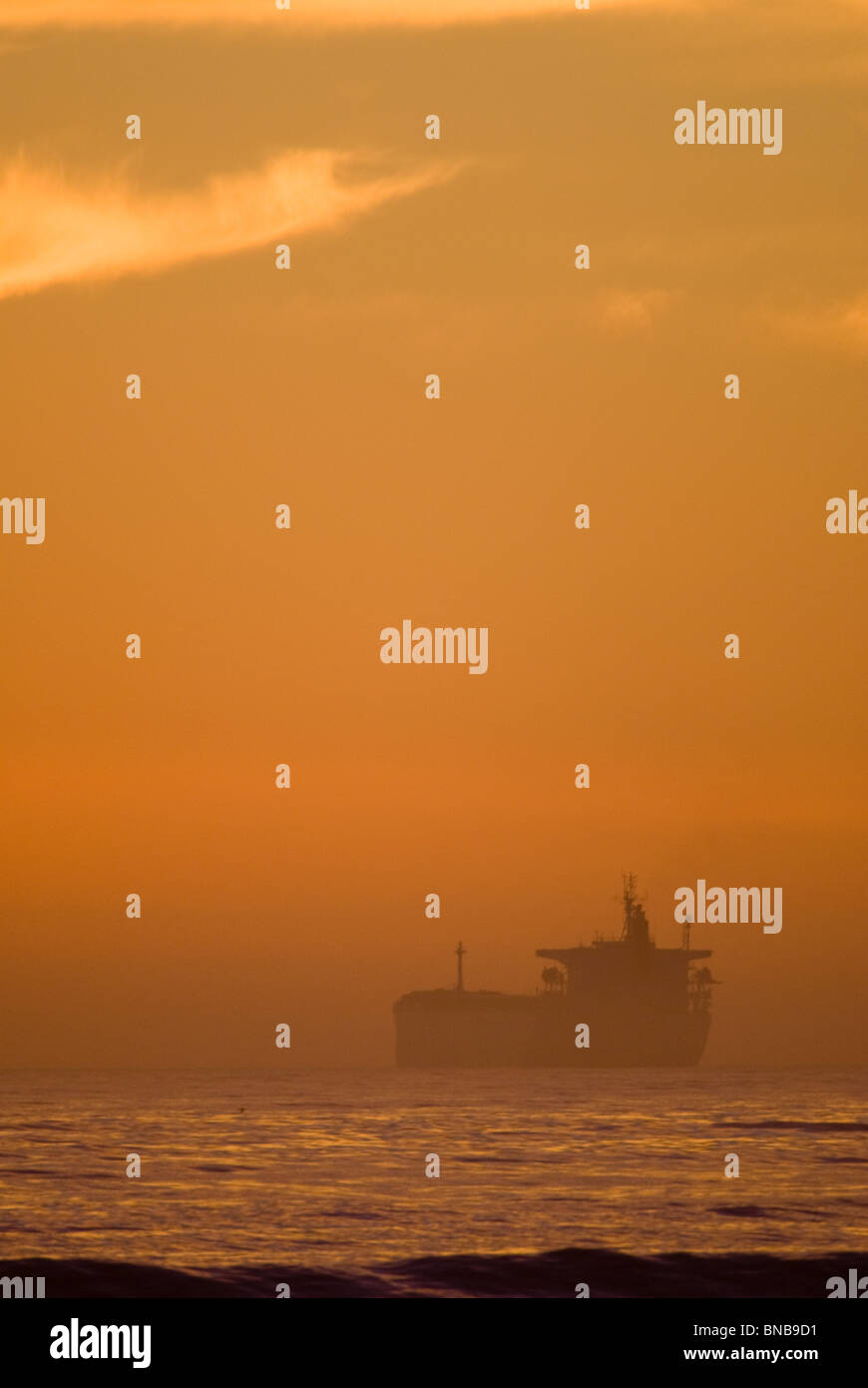 Container ship sea sunset hi-res stock photography and images - Alamy
