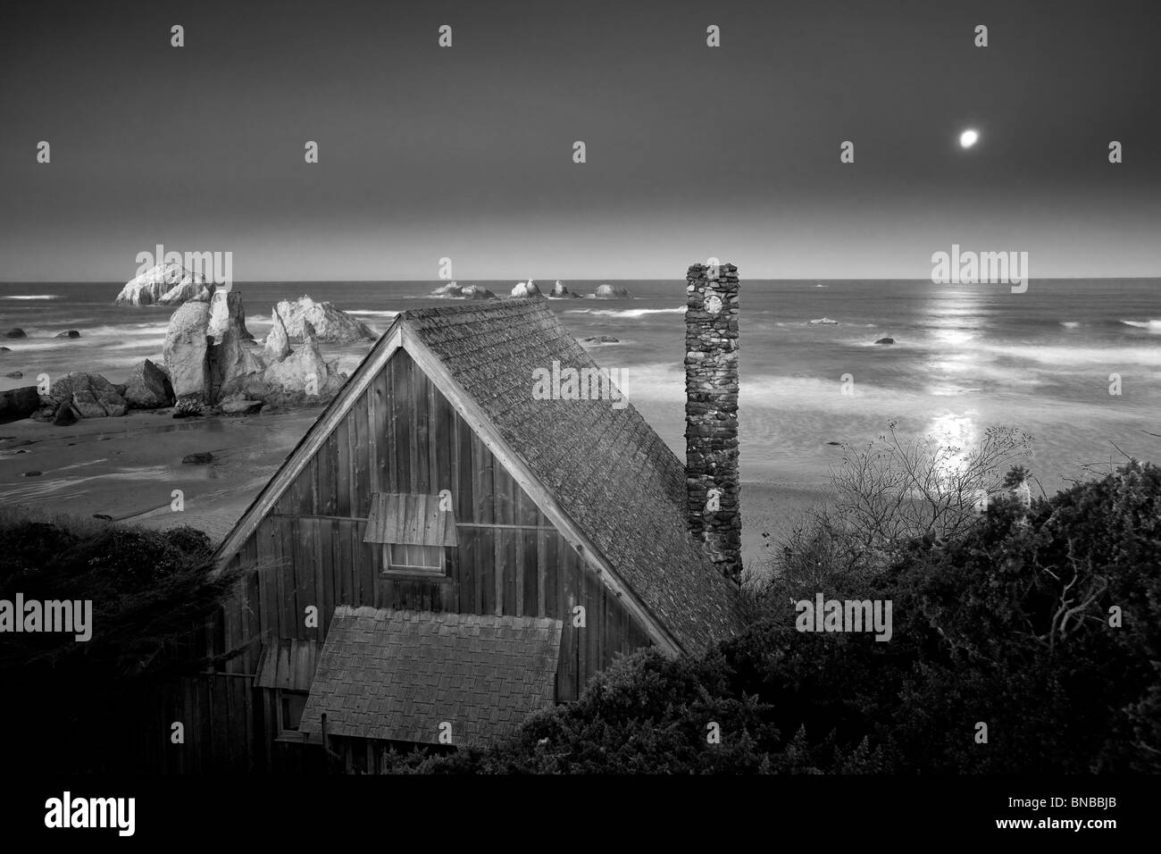 Cabin overlooking Bandon beach with moon set. Bandon, Oregon Stock ...