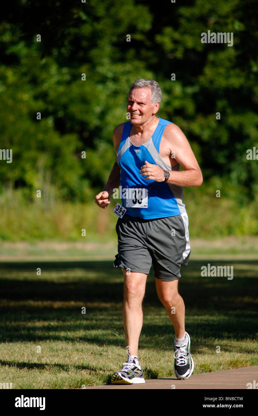 Male and female Marathon runners and joggers of all ages, shapes, sizes ...
