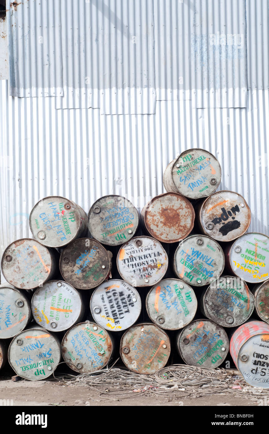 pile of metal drums at harbour Stock Photo - Alamy
