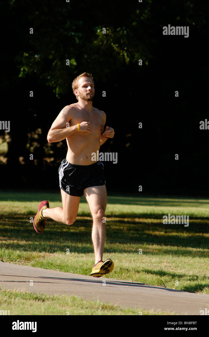 Male and female Marathon runners and joggers of all ages, shapes, sizes ...